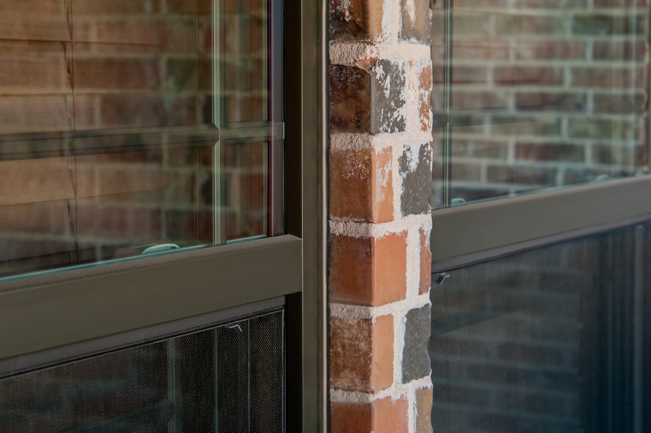 Brennan Traditions Bronze and White Windows With Prairie Grids